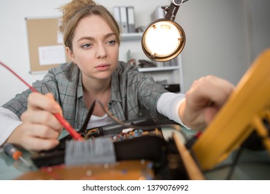 Female Computer Technician Using Multimeter Stock Photo 1379076992 ...