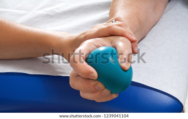 Female Hand Stimulation Using Exercise Blue Stock Photo (Edit Now ...