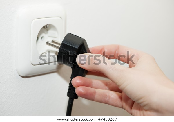 Female Hand Unplugging Plug Socket Metaphor Stock Photo 47438269 ...