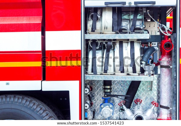 Fire Engine Side View Neatly Folded 스톡 사진(지금 편집) 1537541423