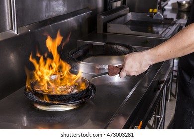 Fire Pan On Stove While Chef Stock Photo 473003281 | Shutterstock