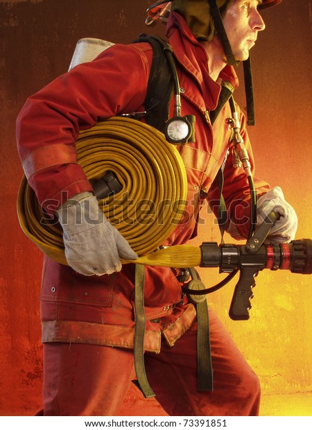 Firefighter Action Stock Photo (Edit Now) 73391851