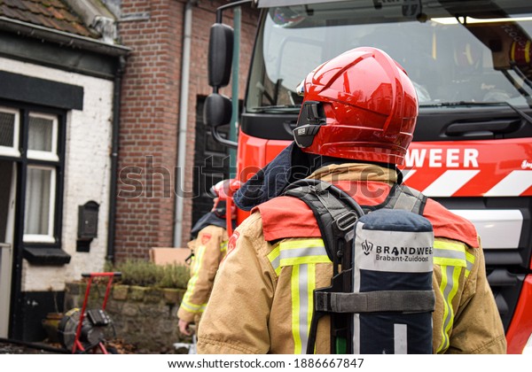 Firefighter Looking Building Structure Fire Stock Photo 1886667847 ...