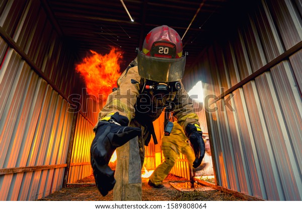 Firefighter Pulls Out Hand Help Fire Stock Photo (Edit Now) 1589808064