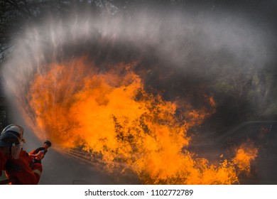 Firefighter Training Fireman Using Water Extinguisher Stock Photo ...