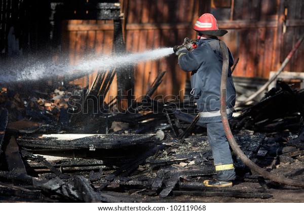 Firefighter Using Hose Stock Photo 102119068 | Shutterstock