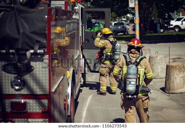 Firefighter Working Walking Back Fire Truck Stock Photo 1106273543 ...