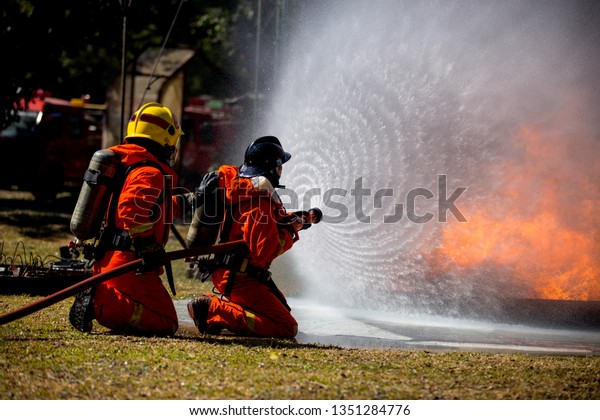 Firefighters Practicing Fire Fighting Virtual Situation Stock Photo ...