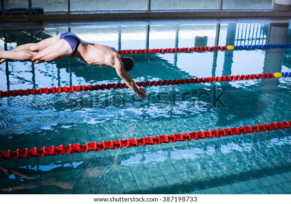 Fit Man Diving Pool Stock Photo (Edit Now) 387198733
