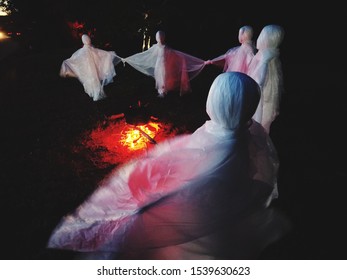 Five Ghostly Figures Floating Around Fire Stock Photo 1539630623 ...