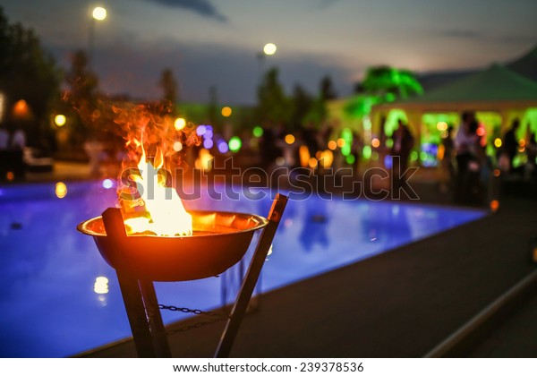 Flaming Torch Sunset By Pool Stock Photo 239378536 | Shutterstock