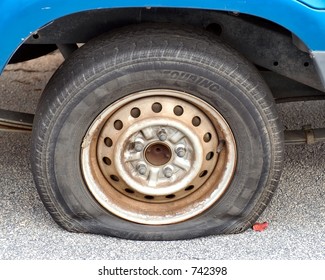 Flat Tire Stock Photo 742398 | Shutterstock