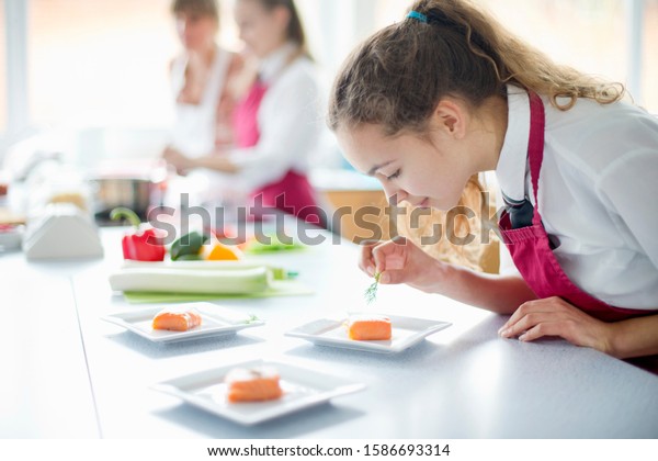 Focused High School Student Plating Food Stock Photo 1586693314 ...
