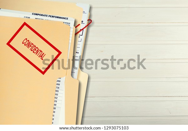Folder Confidential Papers On Table Stock Photo (Edit Now) 1293075103