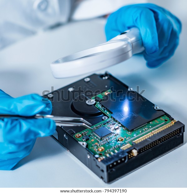 Forensic Science Expert Examining Hard Drive Stock Photo (Edit Now ...