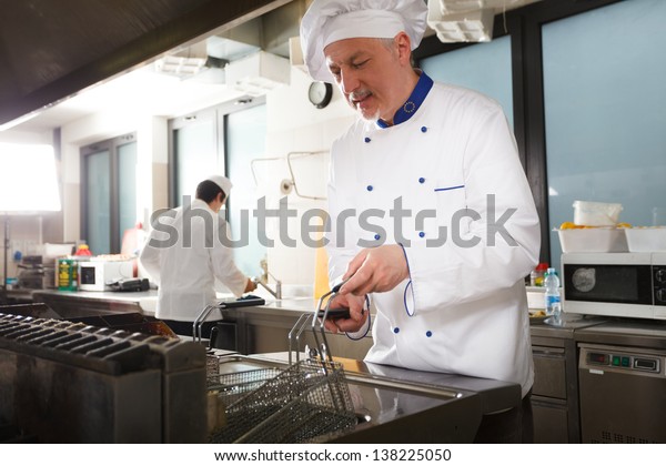 Friendly Chef Working His Kitchen Stock Photo (Edit Now) 138225050