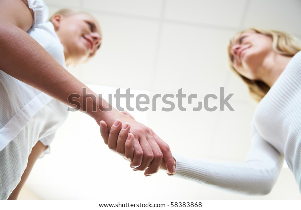 Friendly Handshake Between Two Young Beautiful Stock Photo 58383868 ...