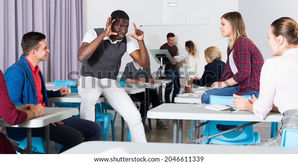 Friendly Multinational Group Students Talking Classroom Stock Photo ...
