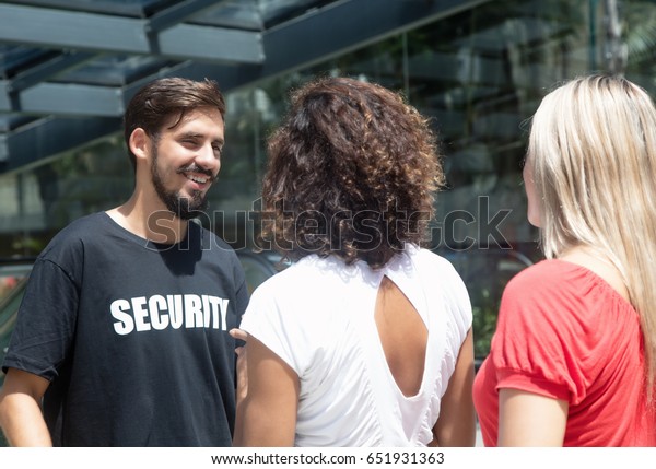 Friendly Security Guard Checking People Entrance Stock Photo 651931363 ...