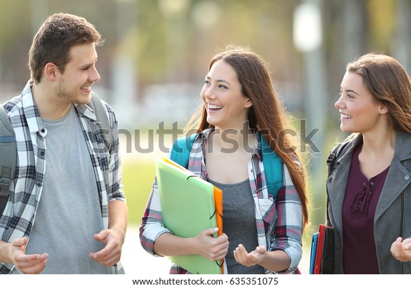 Front View Three Students Walking Talking Stock Photo 635351075 ...