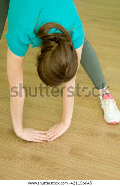 Girl Bended Down Doing Exercise 스톡 사진 421156645 | Shutterstock