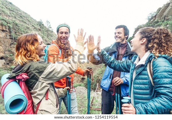 Group Friends Stacking Hands While Doing Stock Photo 1254119554 ...