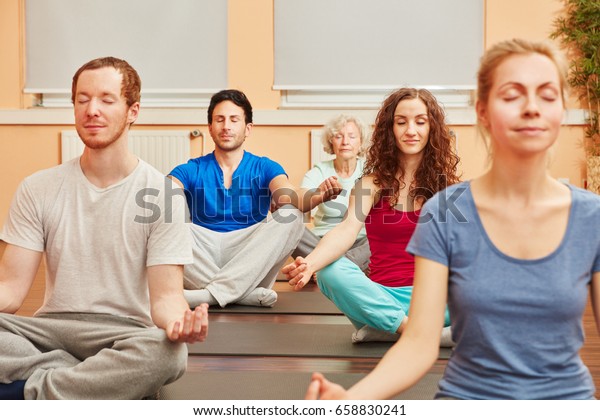 Group Making Breathing Exercise During Meditation Stock Photo 658830241 ...