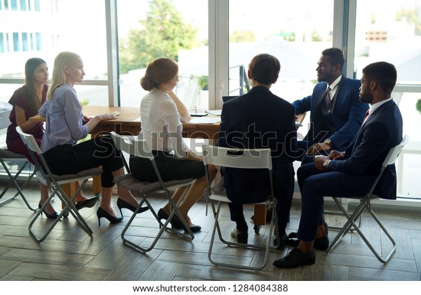 Group People Sitting Table Work Office Stock Photo 1284084388 ...