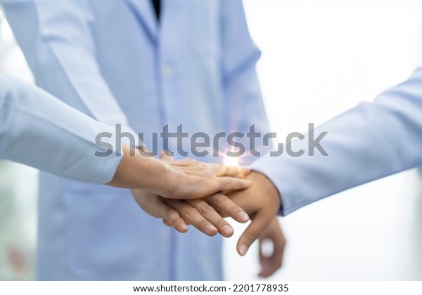 Group Pharmacists Join Hands Work Together Stock Photo 2201778935 ...