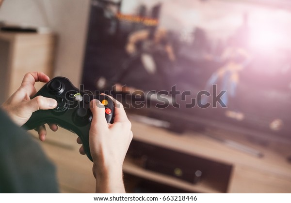Guy Playing On Console Stock Photo (Edit Now) 663218446