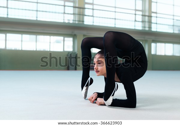 Gymnast Performs Back Bend On Floor Stock Photo (Edit Now) 366623903