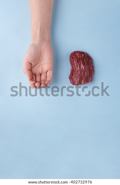Hand Beef Blue Background Stock Photo 402732976 | Shutterstock