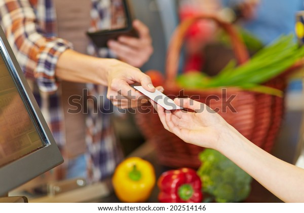 Hand Customer Giving Credit Card Supermarket Stock Photo (Edit Now ... Hand Customer Giving Credit Card Supermarket Stock Photo (Edit Now ...