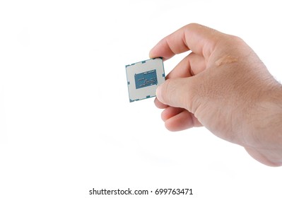 Hand Holding Cpu Processor On Isolated Stock Photo 699763471 | Shutterstock