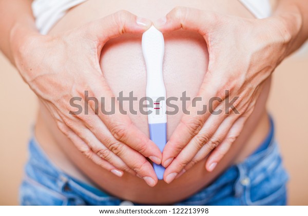 Hand Holding Positive Result Pregnancy Test Stock Photo (Edit Now ... Hand Holding Positive Result Pregnancy Test Stock Photo (Edit Now ...