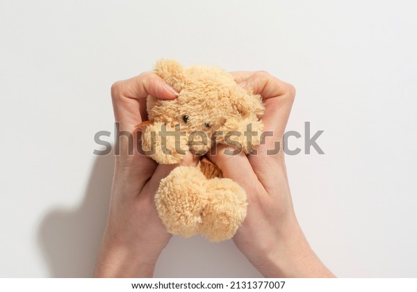 Hand Holding Squashed Teddy Bear Toy Stock Photo 2131377007 | Shutterstock