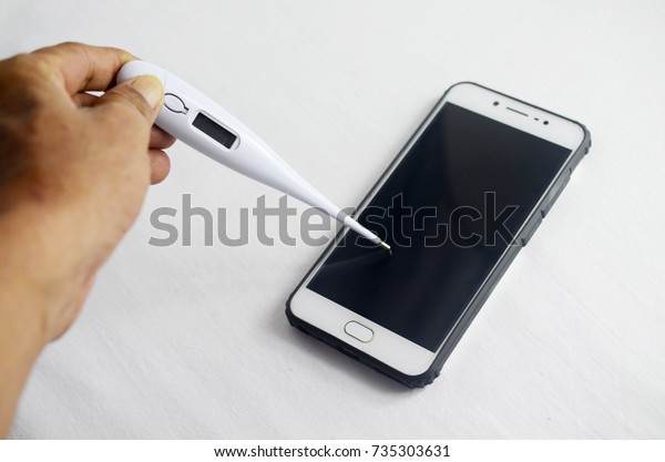 Hand Holding Temperature Sensor On Smartphone Stock Photo 735303631 ...