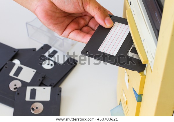 Hand Inserting 35inch Floppy Disk Into Stock Photo 450700621 | Shutterstock