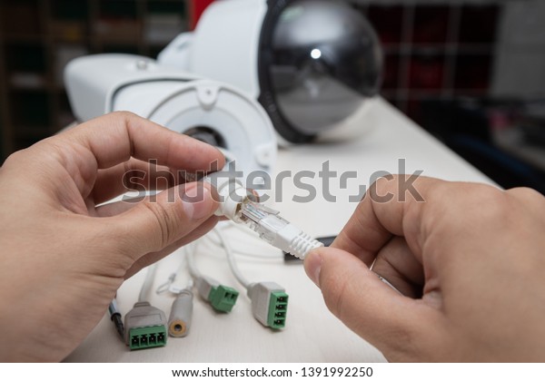Hand Inserting Ethernet Cable Into Network Stock Photo 1391992250 ...