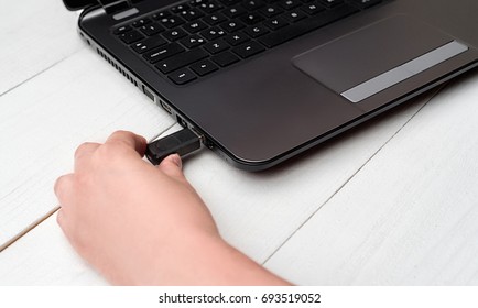 42 Women Hand Plugging In Usb Pendrive On A Laptop At Home Images ...