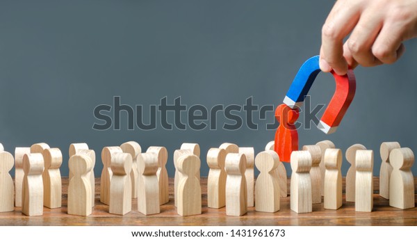 Hand Magnet Pulls Red Human Figure Stock Photo (Edit Now) 1431961673