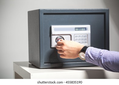2,591 Close up of a hand locking a safe Images, Stock Photos & Vectors ...