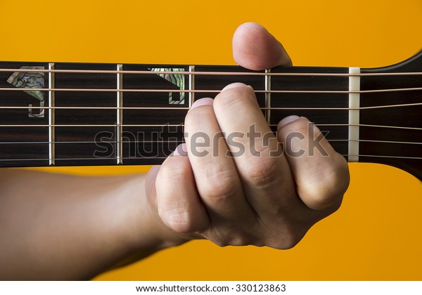 Hand Performing E Chord On Guitar Stock Photo 330123863 | Shutterstock