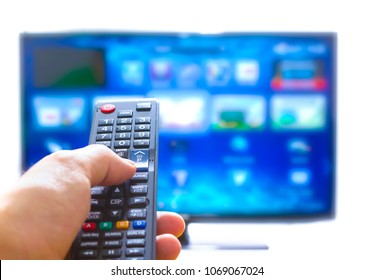 Hand Pressing On Remote Control Changes Stock Photo 1069067024 ...