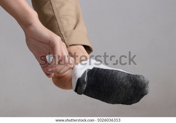 Hand Pulling Out Sock Isolated On Stock Photo 1026036313 | Shutterstock