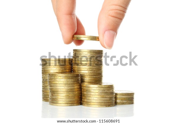 Poner a mano monedas en un Foto de stock 115608691 | Shutterstock