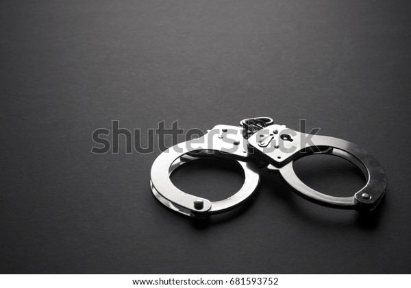 Handcuffs Stock Photo (Edit Now) 681593752