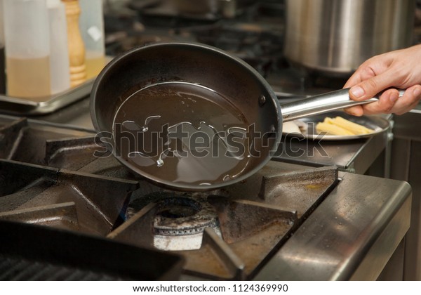 Hands Chef Heating Pan Stock Photo (Edit Now) 1124369990