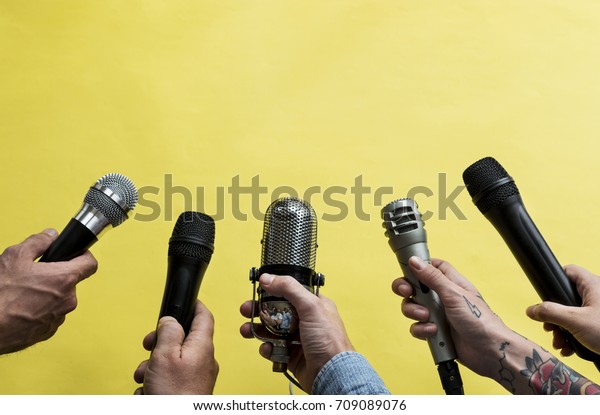 Hands Holding Microphone Point Same Direction Stock Photo 709089076 ...