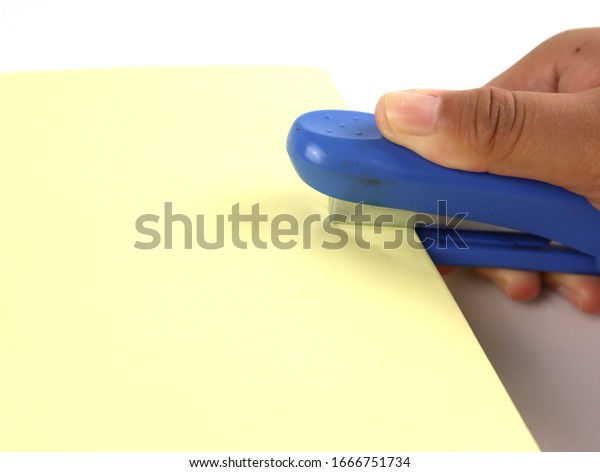 Hands Holding Stapler Stapling Paper Isolated Stock Photo 1666751734 ...